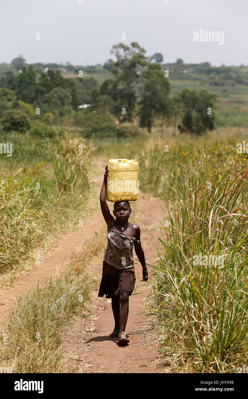 Ugandan child fetching water. Uganda Stock Photo - Alamy