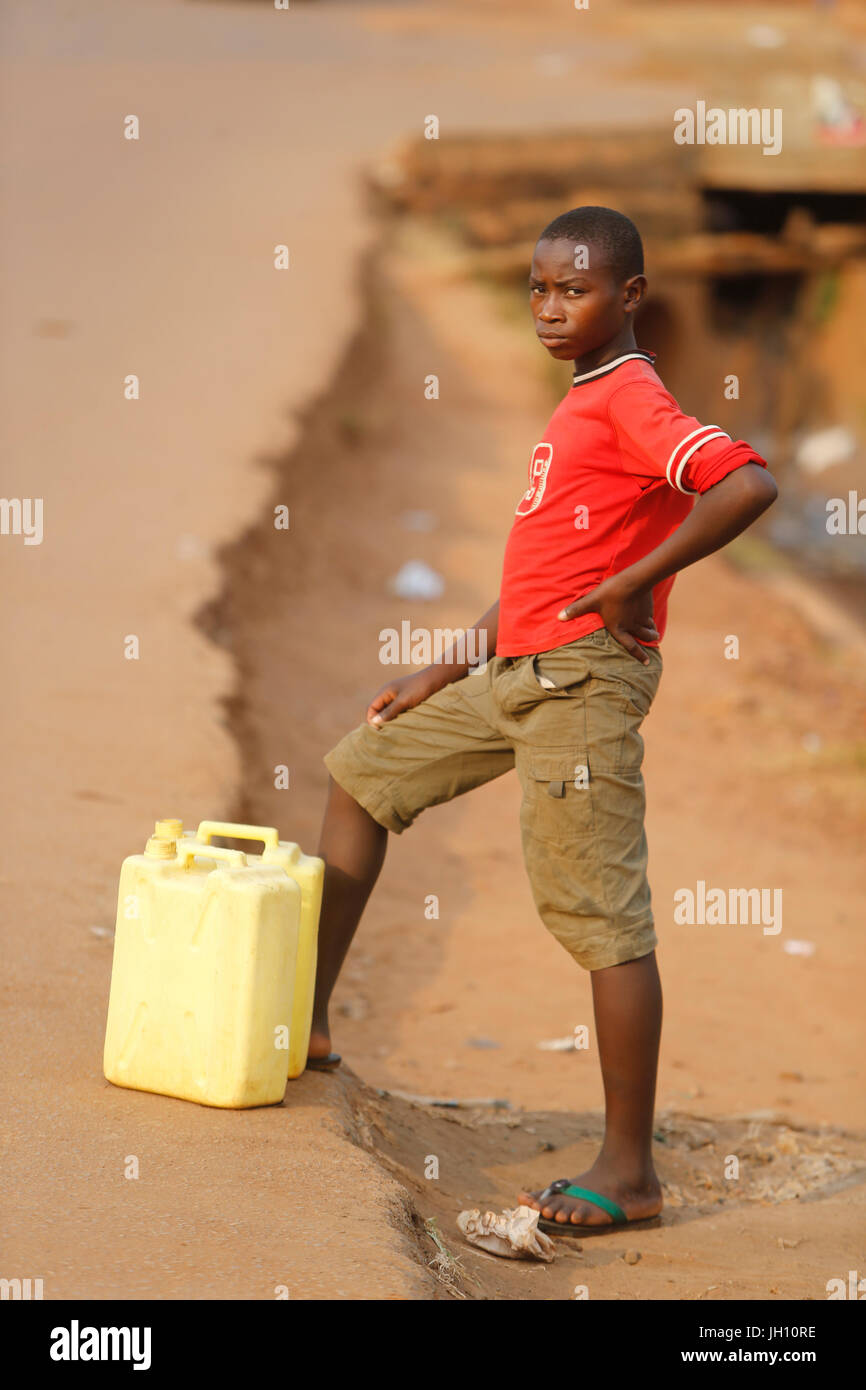 Boy fetching water hi-res stock photography and images - Alamy