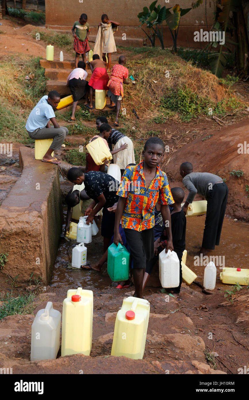 Boy fetching water hi-res stock photography and images - Alamy