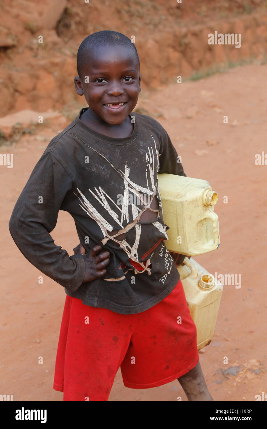 Boy Fetching Water High Resolution Stock Photography and Images - Alamy