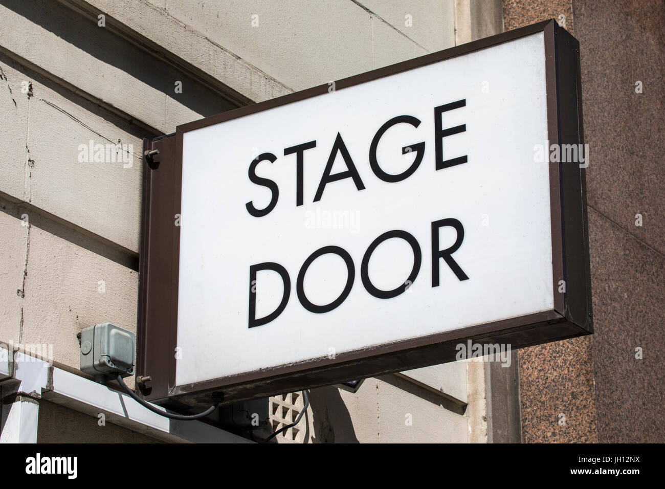 A Stage Door sign at a theatre Stock Photo - Alamy