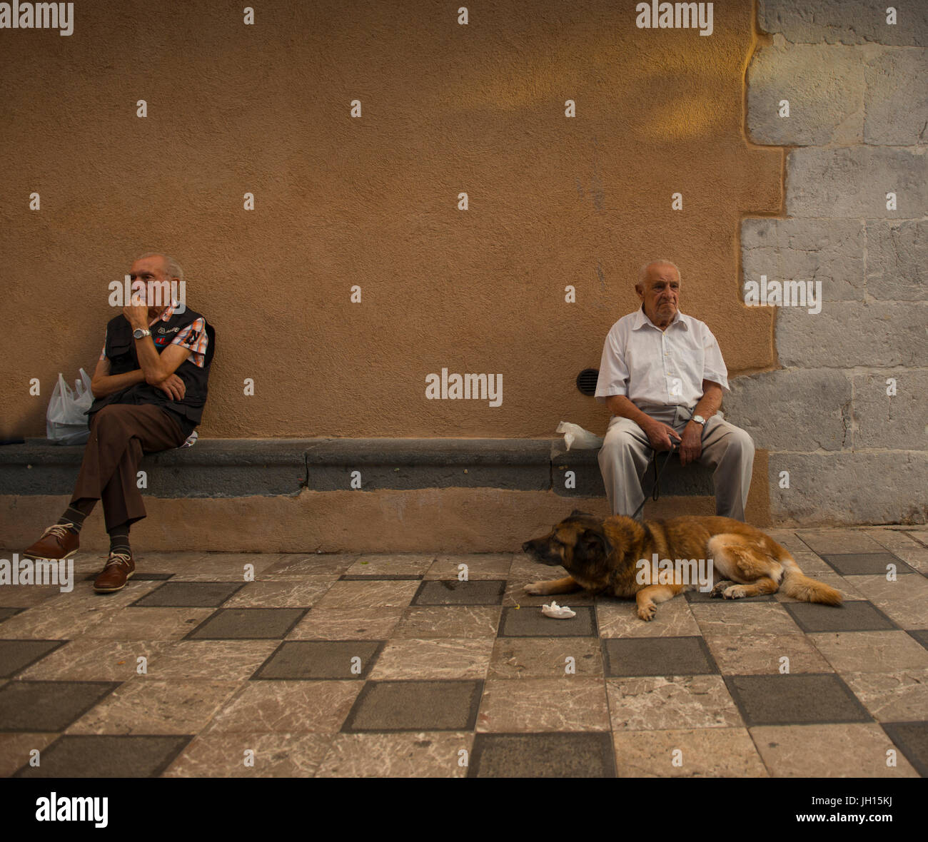 Old men sitting hi-res stock photography and images - Alamy