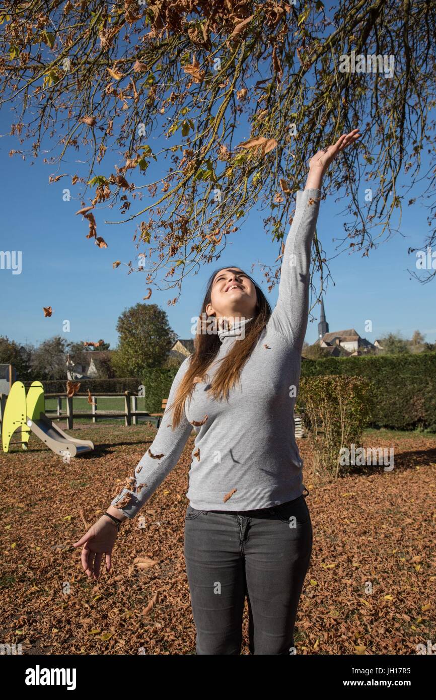 DAUGHTER AND FAMILY IN AUTUMN Stock Photo - Alamy