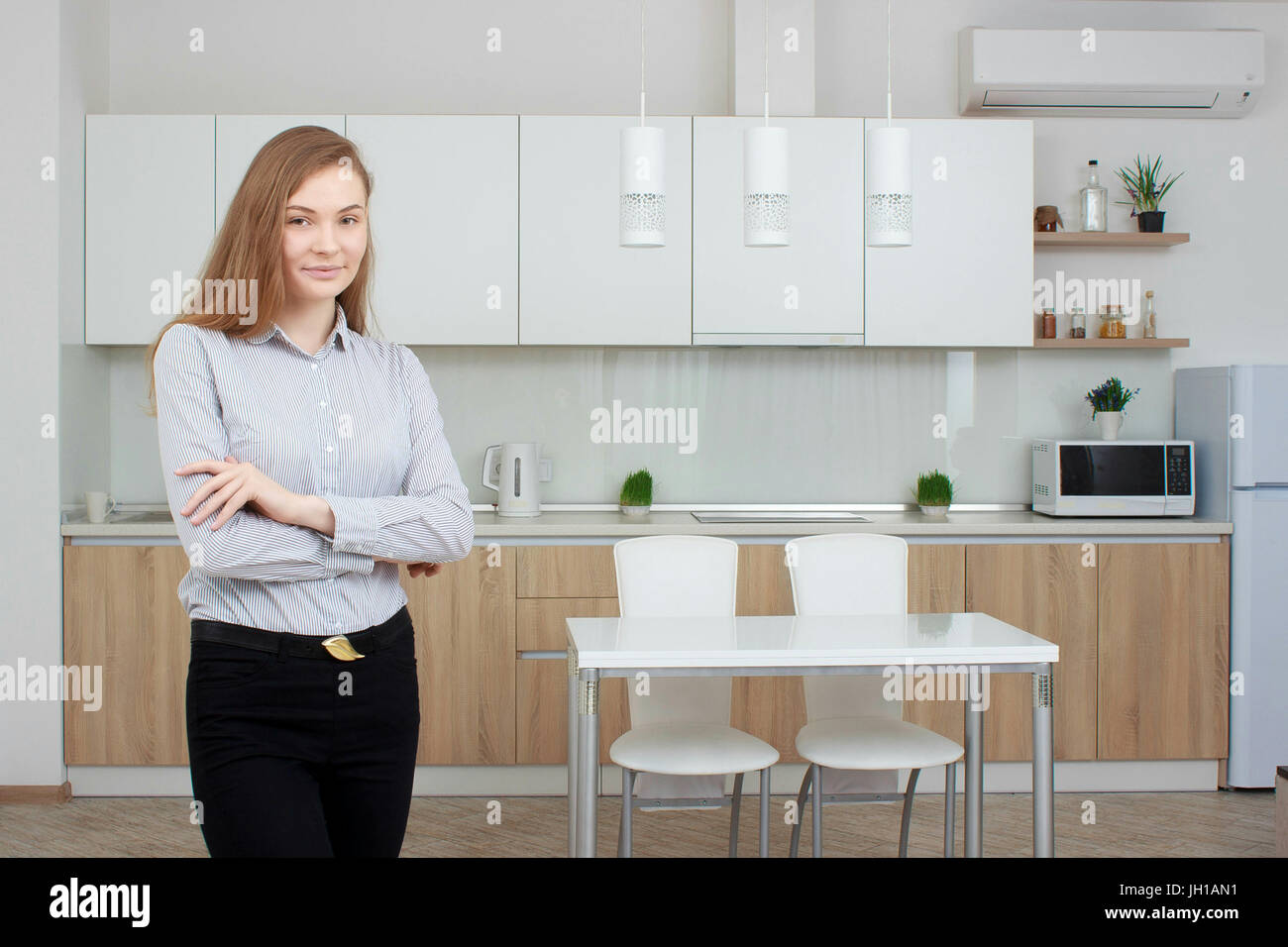 Realtor in dinner room proposes to view a flat - real estate Stock ...