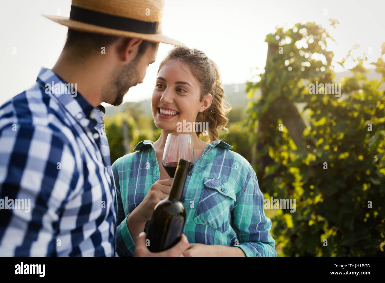 People sampling and tasting wines in vineyard Stock Photo - Alamy
