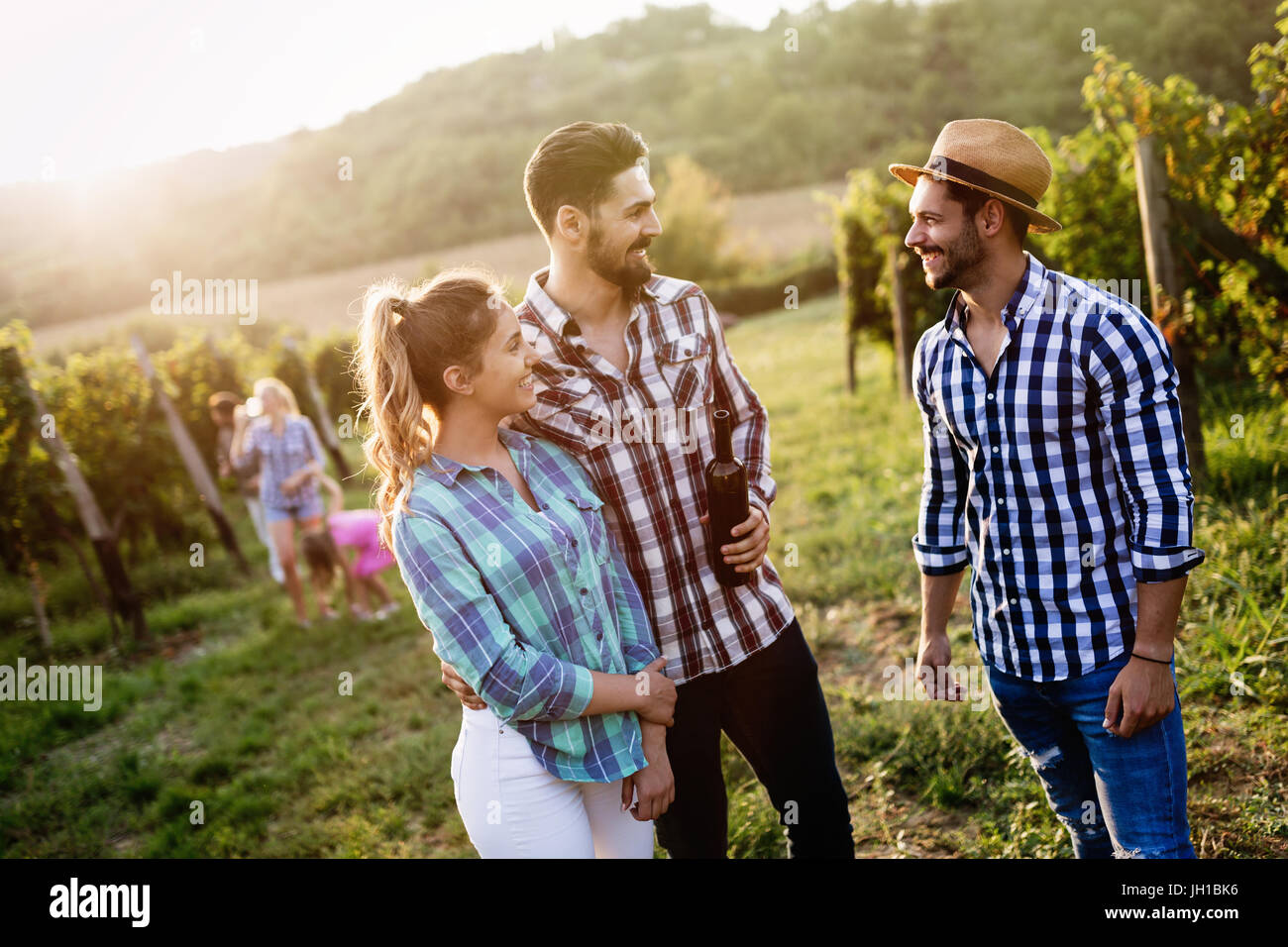 People tasting wine in vineyard Stock Photo - Alamy