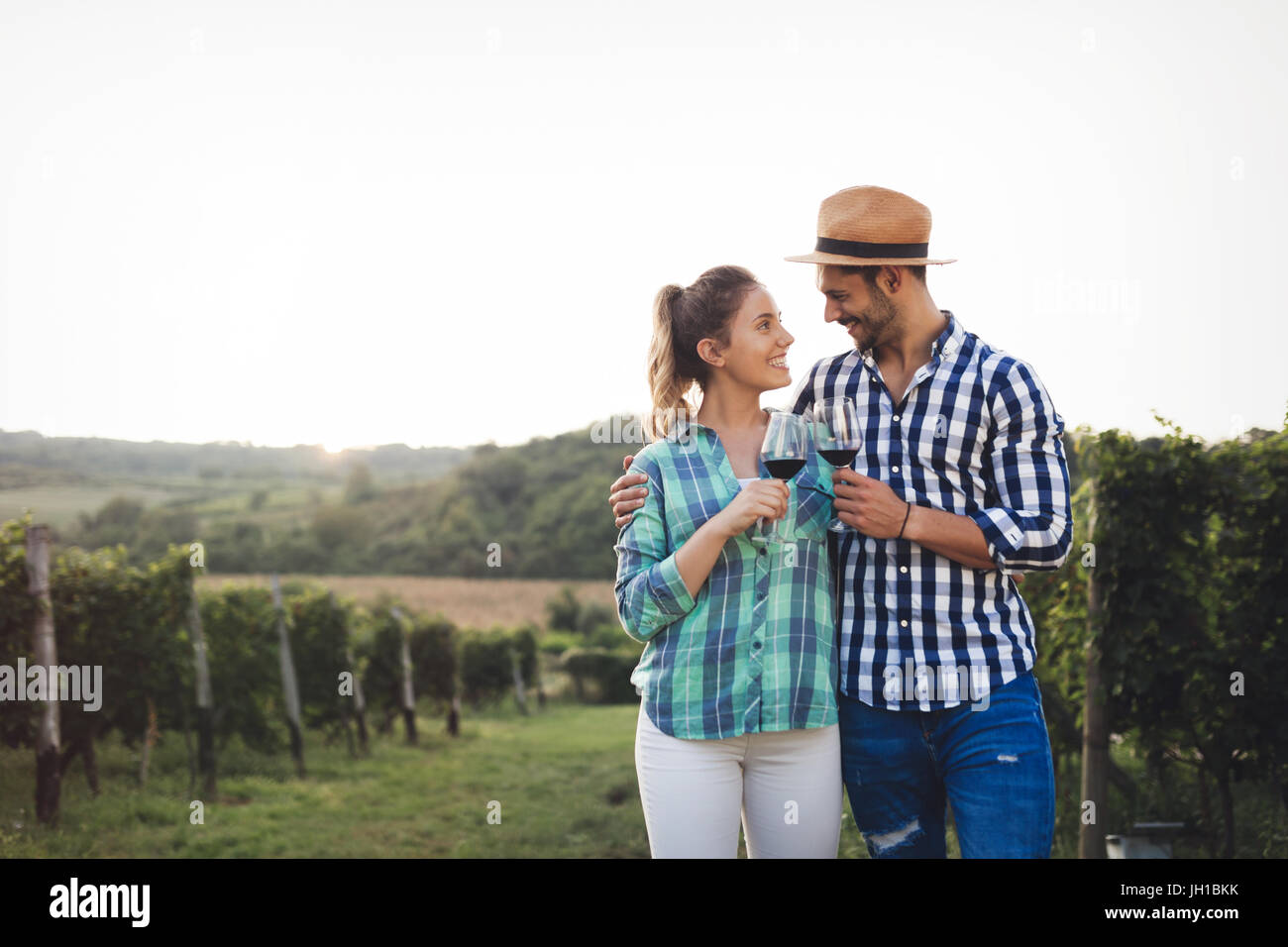 People tasting wine in vineyard Stock Photo - Alamy