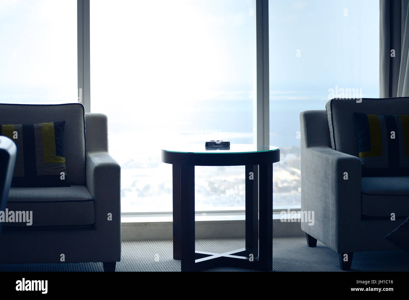 Sofa and stool Stock Photo - Alamy