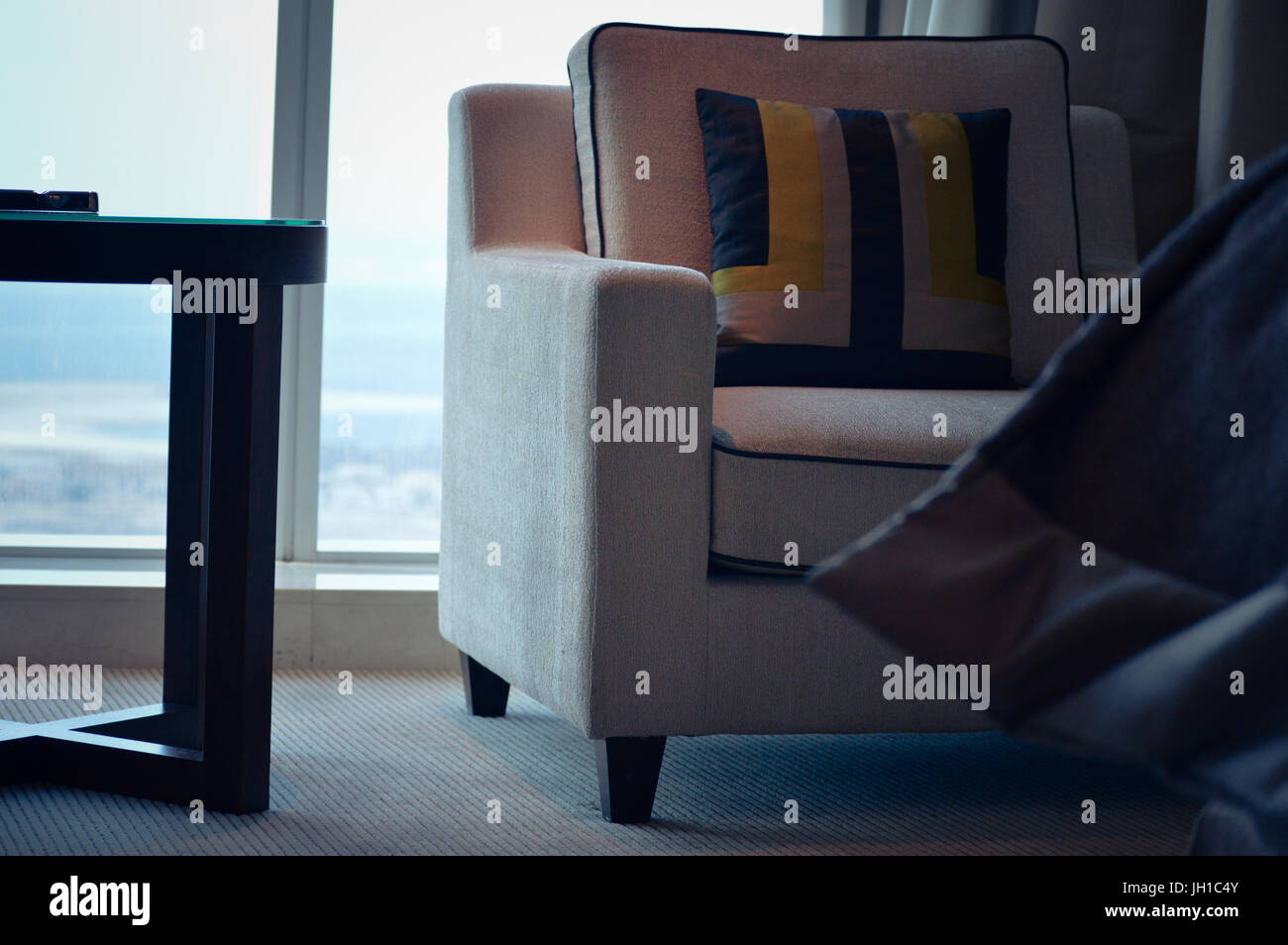 Sofa and stool Stock Photo - Alamy