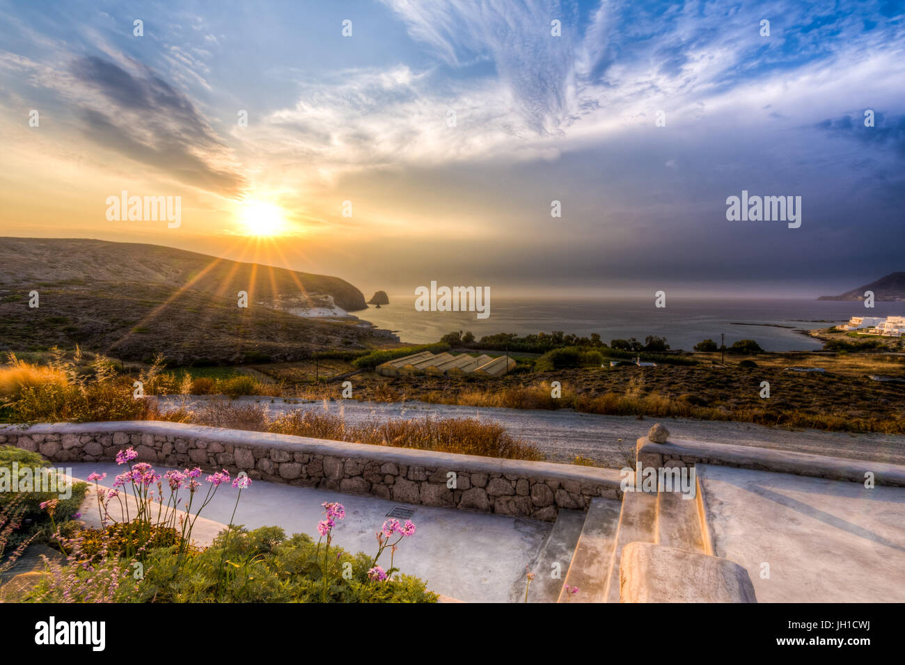 Sunset at Apollonia ('Polonia') village in Milos, Greece Stock Photo ...