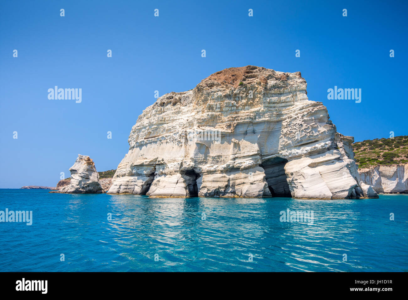 Rock formations and sea caves at Kleftiko shoreline in Milos, Greece ...