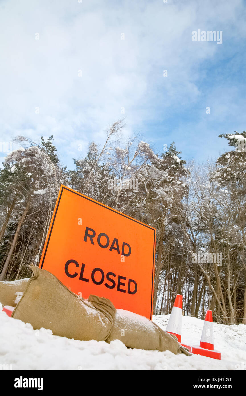 road closed sign on a snow covered highway Stock Photo - Alamy