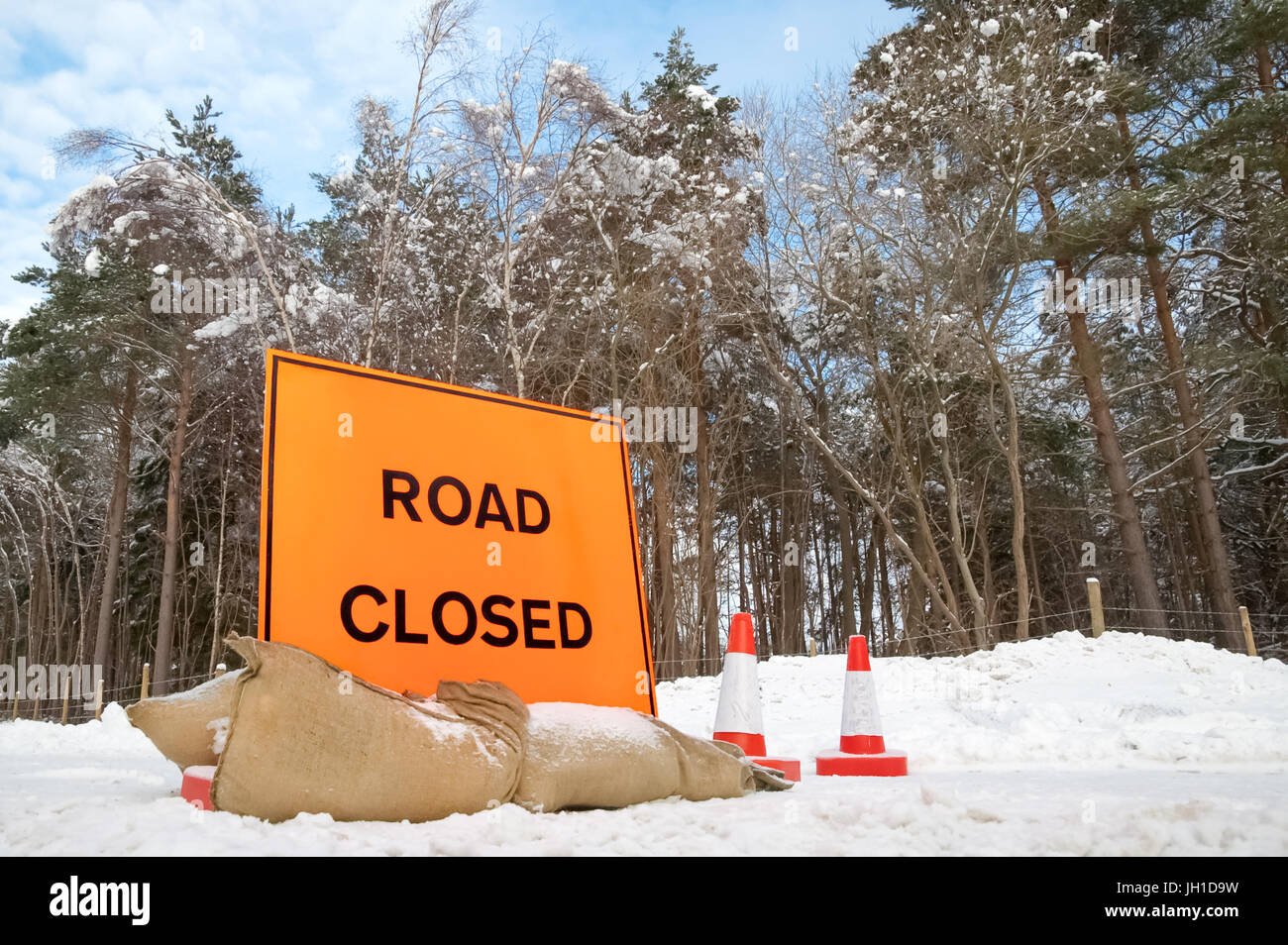 road closed sign on a snow covered highway Stock Photo - Alamy