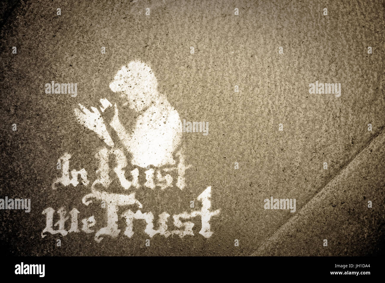 in rust we trust slogan on a decaying metal background Stock Photo - Alamy