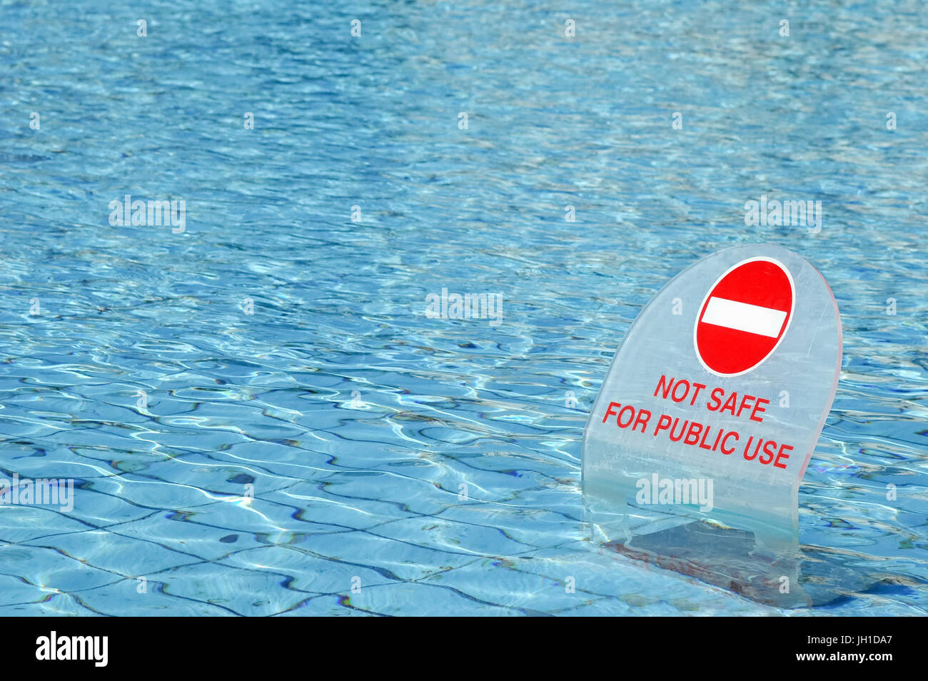 warning sign in a public swimming pool Stock Photo - Alamy