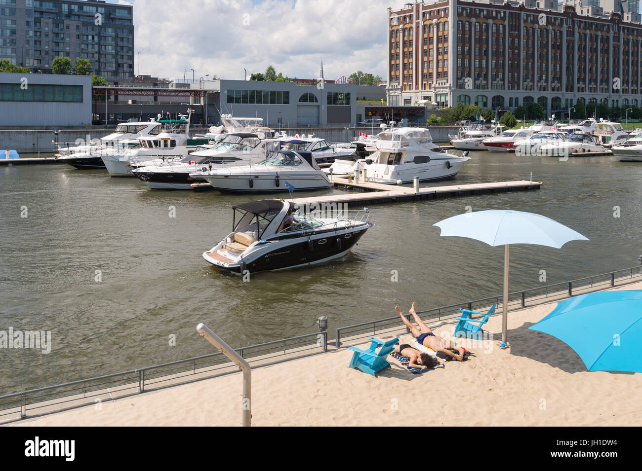 Montreal, CA - 9 July 2017: Clock Tower Beach in the Old Port of ...