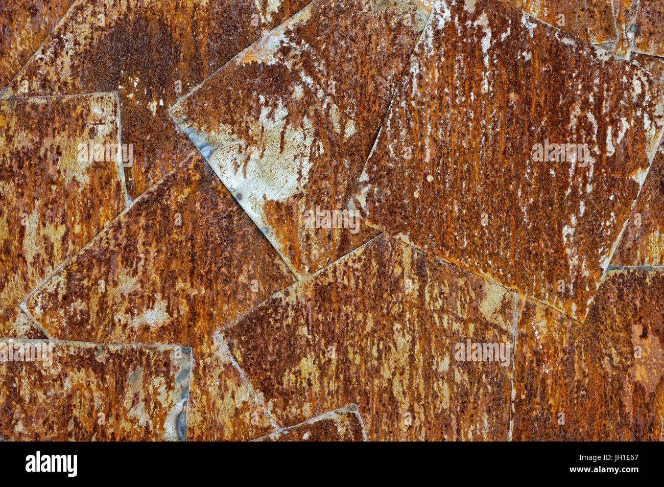 Backgrounds and textures: arrangement of rusty metal sheets, abstract ...