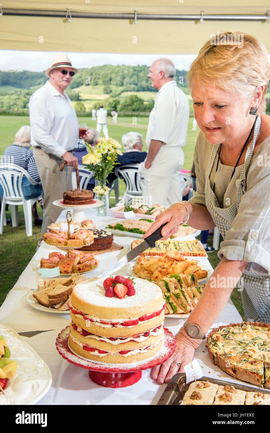 A classic cricket tea at North Nibley Cricket Club, Gloucestershire, UK ...