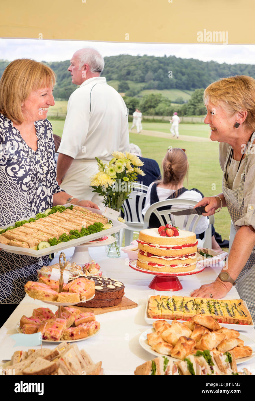 A classic cricket tea at North Nibley Cricket Club, Gloucestershire, UK ...