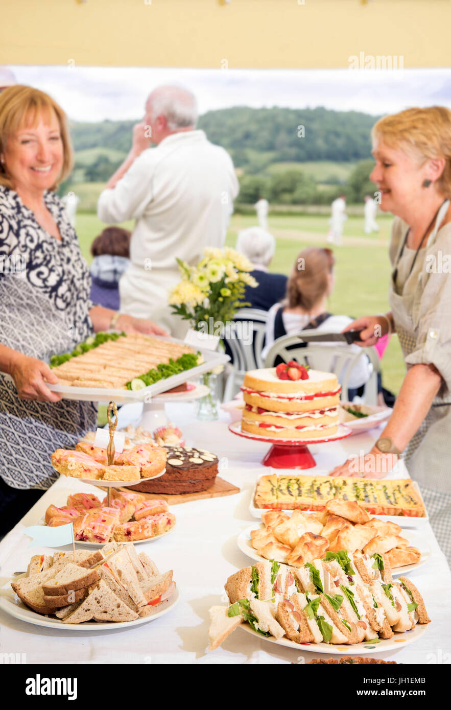 A classic cricket tea at North Nibley Cricket Club, Gloucestershire, UK ...