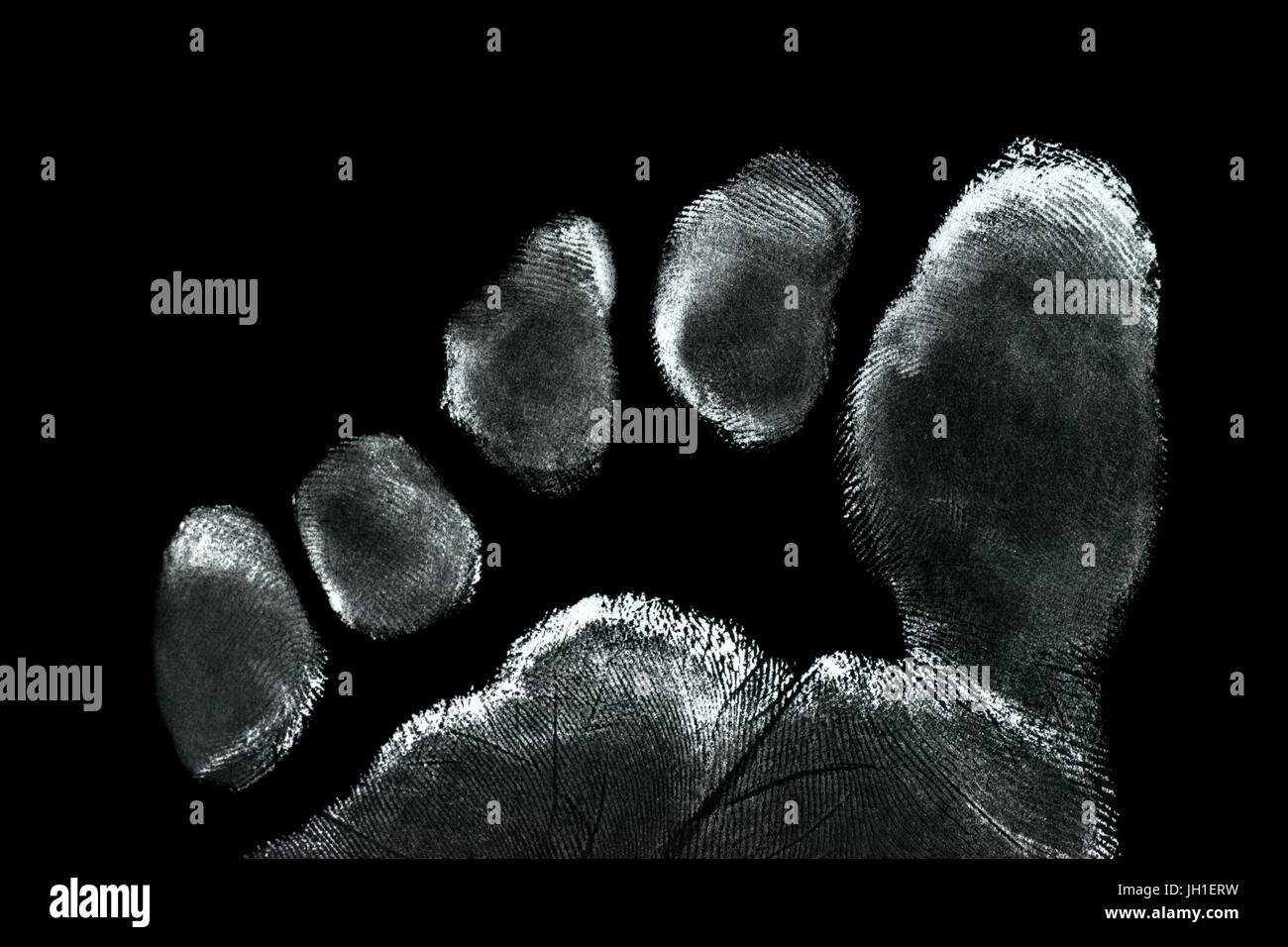 Foot finger print on black background Stock Photo - Alamy