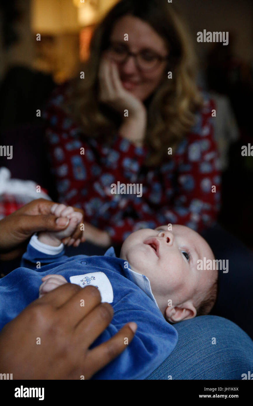 Baby with two mothers. France Stock Photo - Alamy