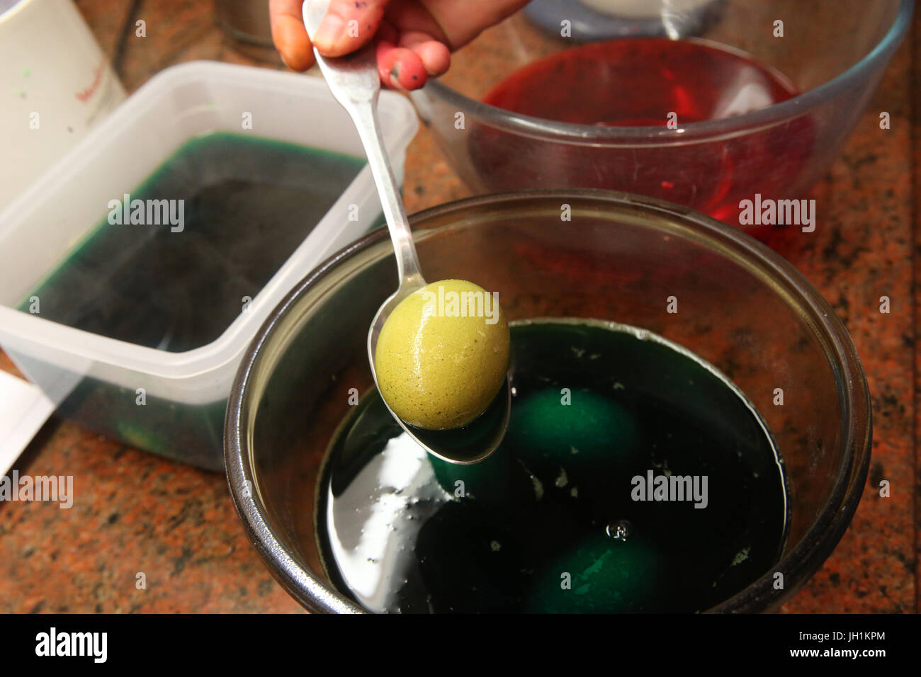 Coloring the eggs hi-res stock photography and images - Alamy