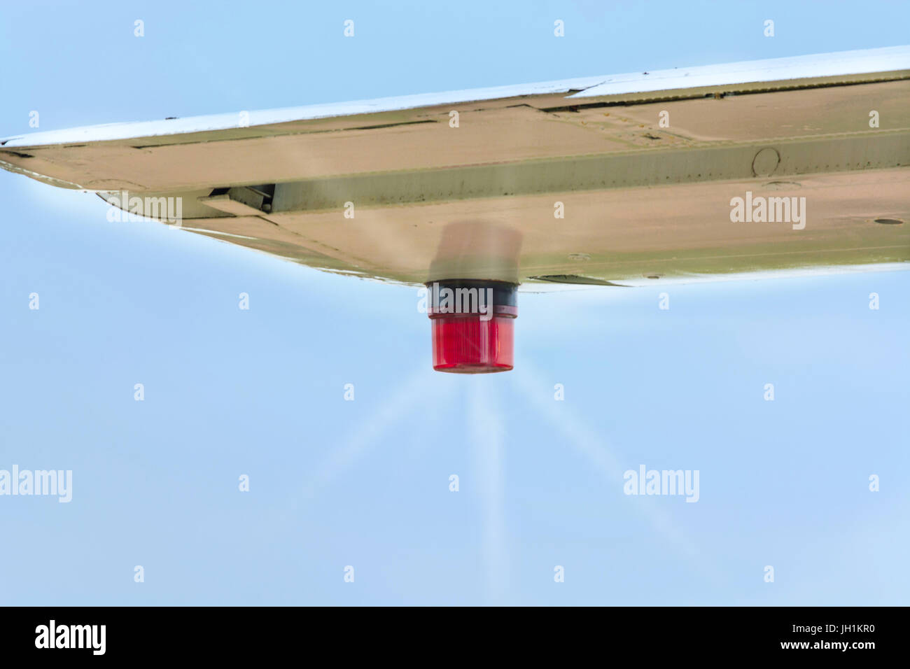 Wing of an airplane with position lighting Stock Photo - Alamy