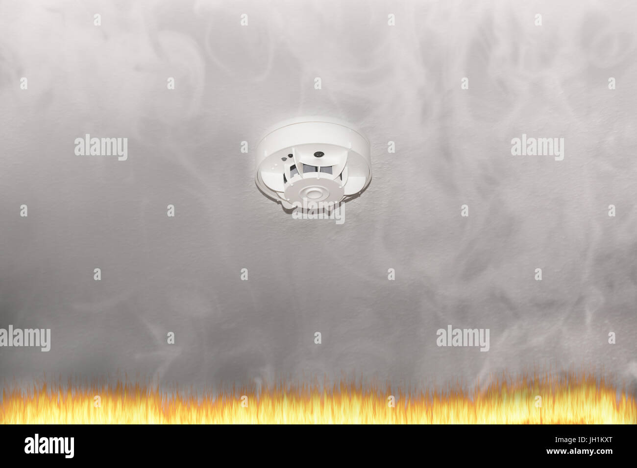 Smoke detector on the ceiling with red warning light sensor and smoke ...