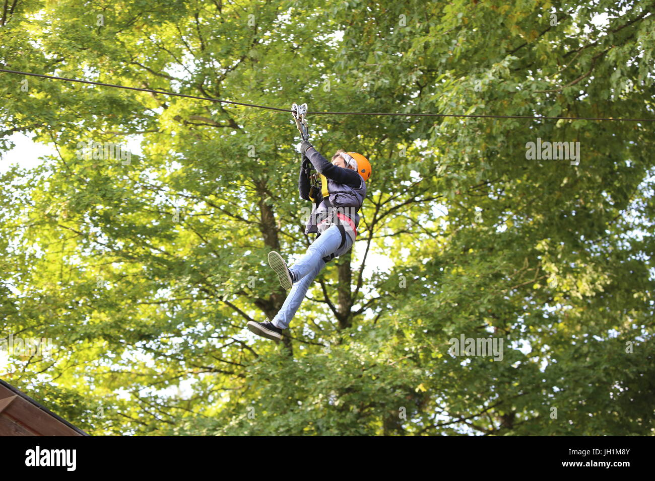 10-year-old boy on a rope course. France Stock Photo - Alamy