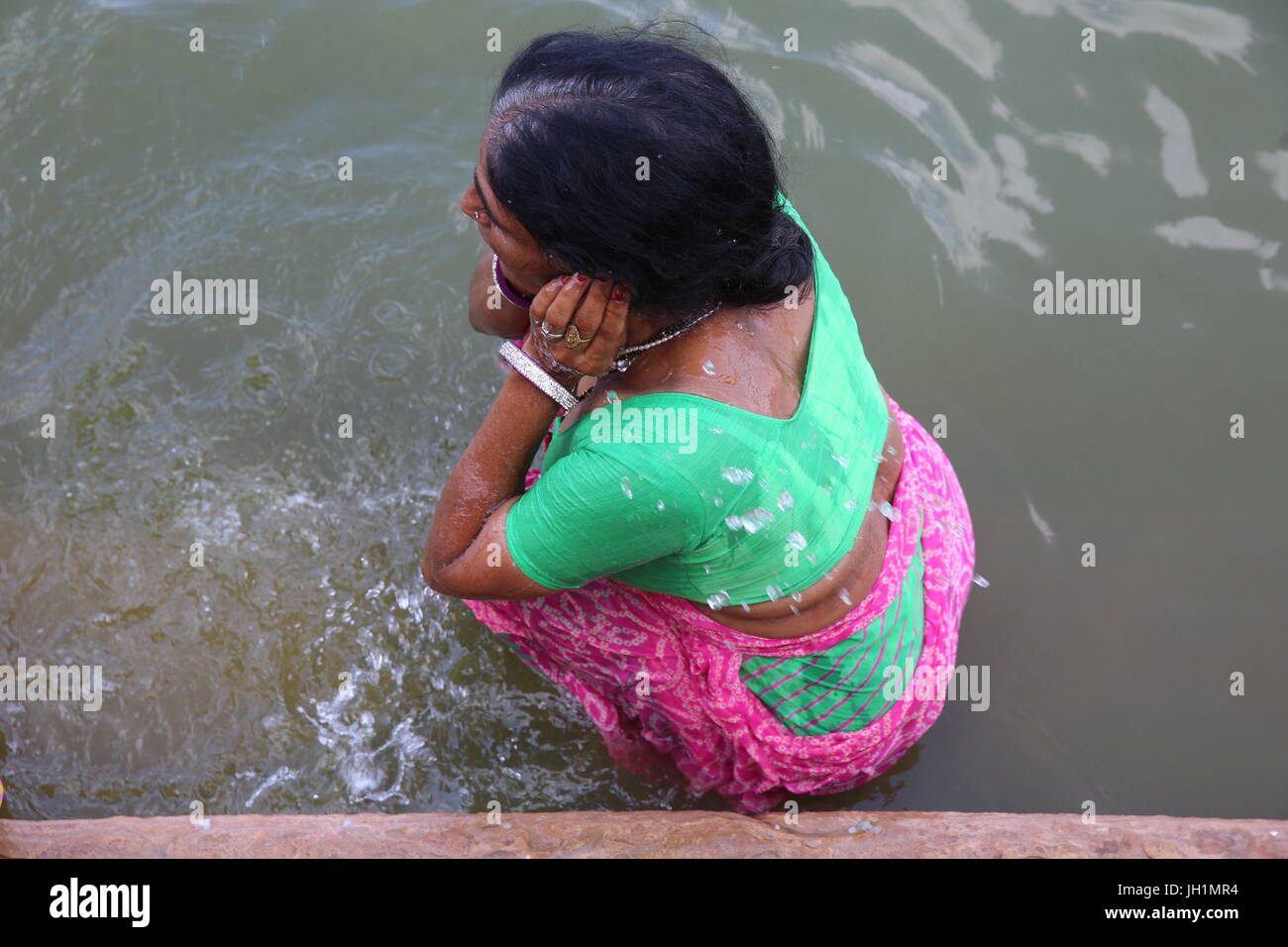Ritual bath in Goverdan Radha Kund. India Stock Photo - Alamy