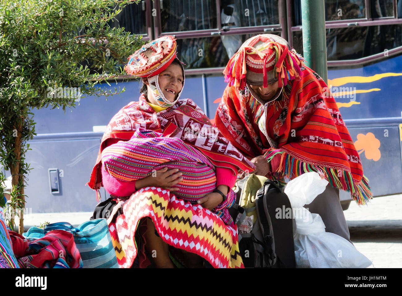 Happy, smiling native peruvian couple from the Cusco Region. Quechua ...