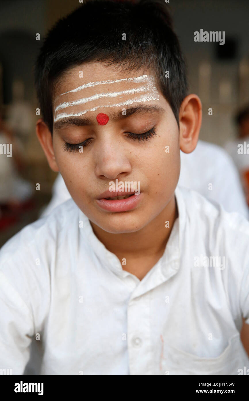 Brahmachari student practising meditation in a Vrindavan temple, Uttar ...