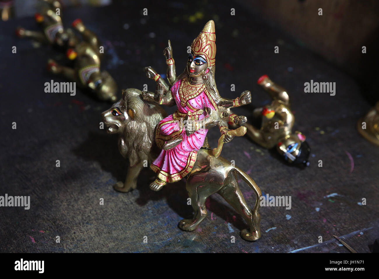 Craftsman's workshop in Vrindavan, Uttar Pradesh. Making a Durga statue ...