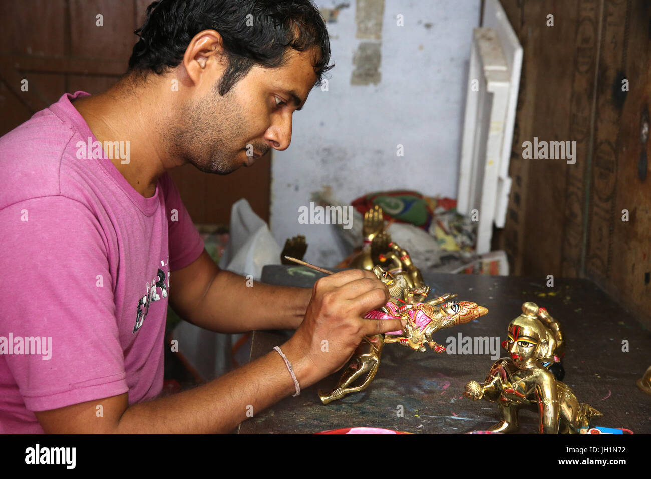 Craftsman's workshop in Vrindavan, Uttar Pradesh. Making a Durga statue ...