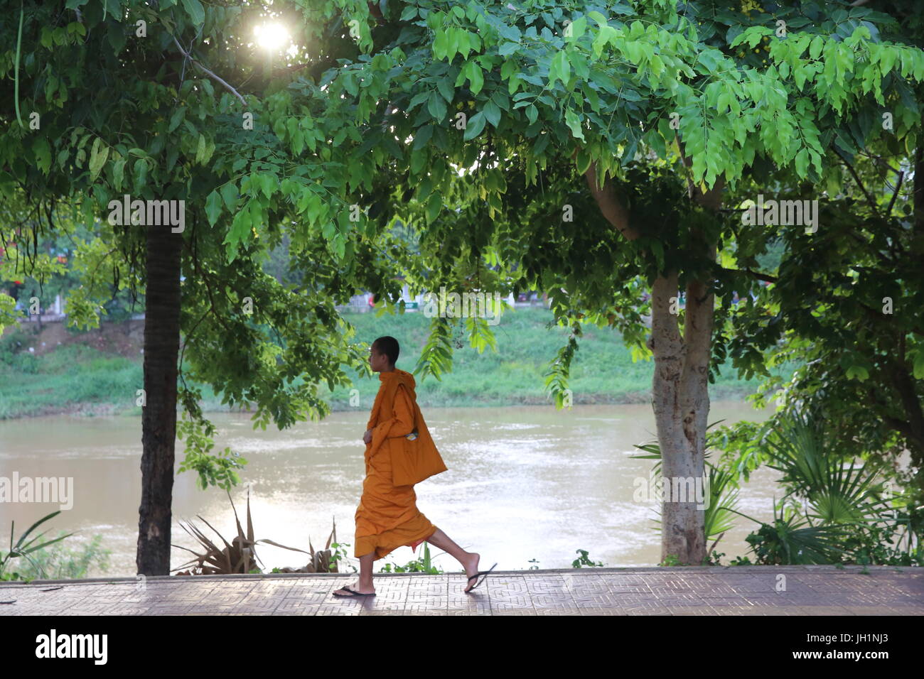 Monk walking in Battambang. Cambodia Stock Photo - Alamy