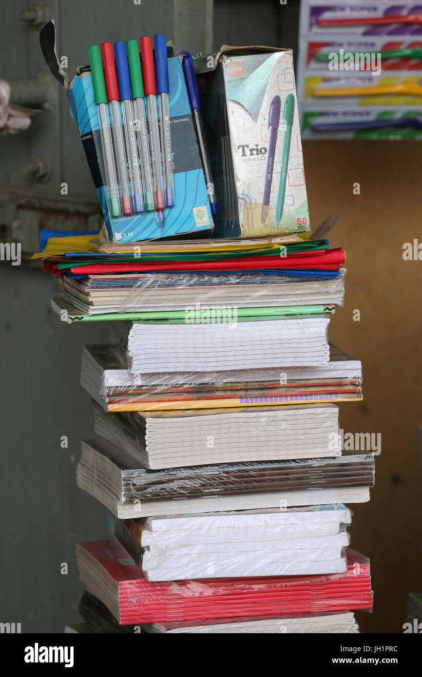 African market. Copy-books and pencils for sale. Lome. Togo Stock Photo ...