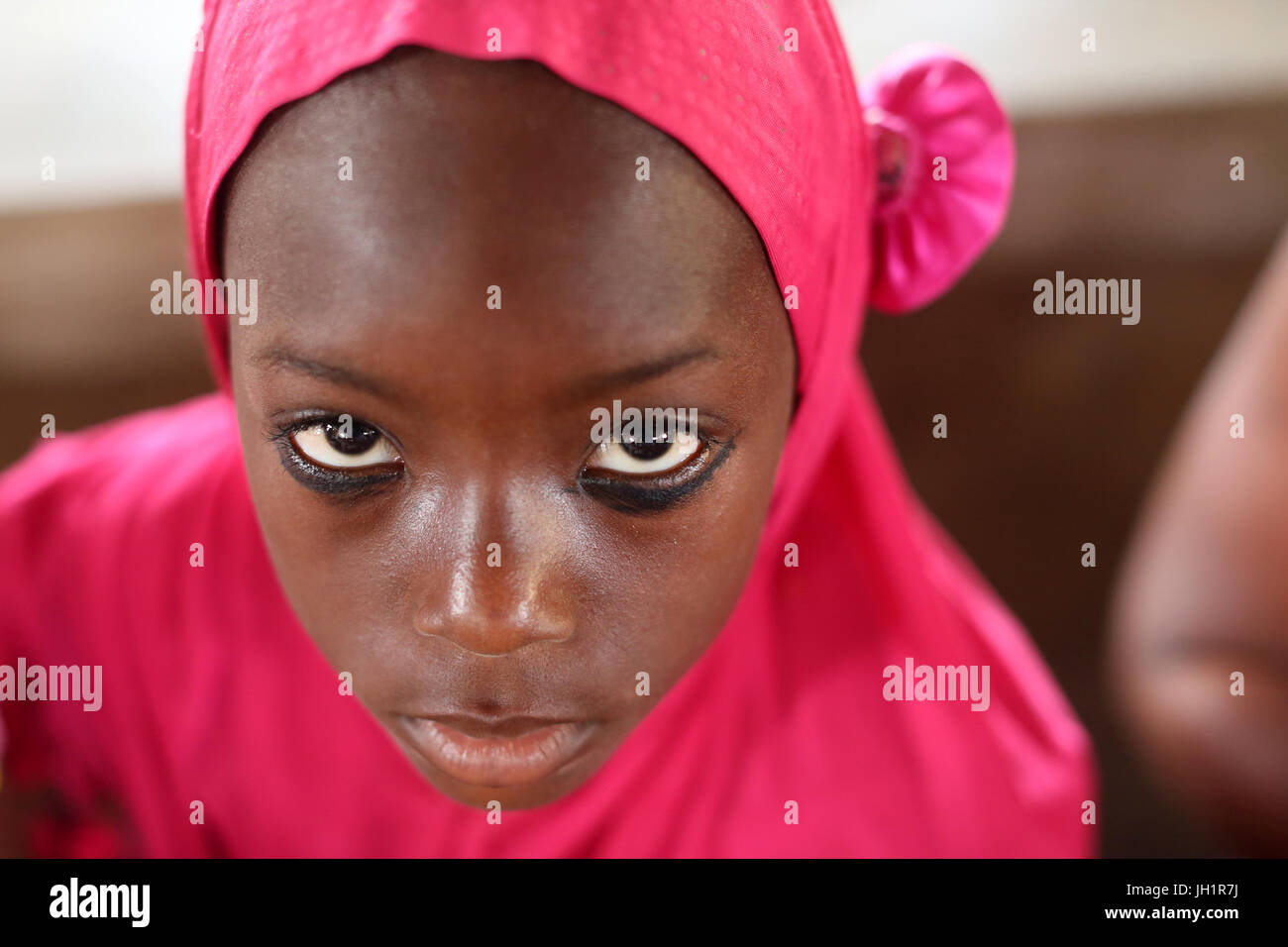 Africain girl wearing muslim veil ( hidjab ). Lome. Togo Stock Photo - Alamy