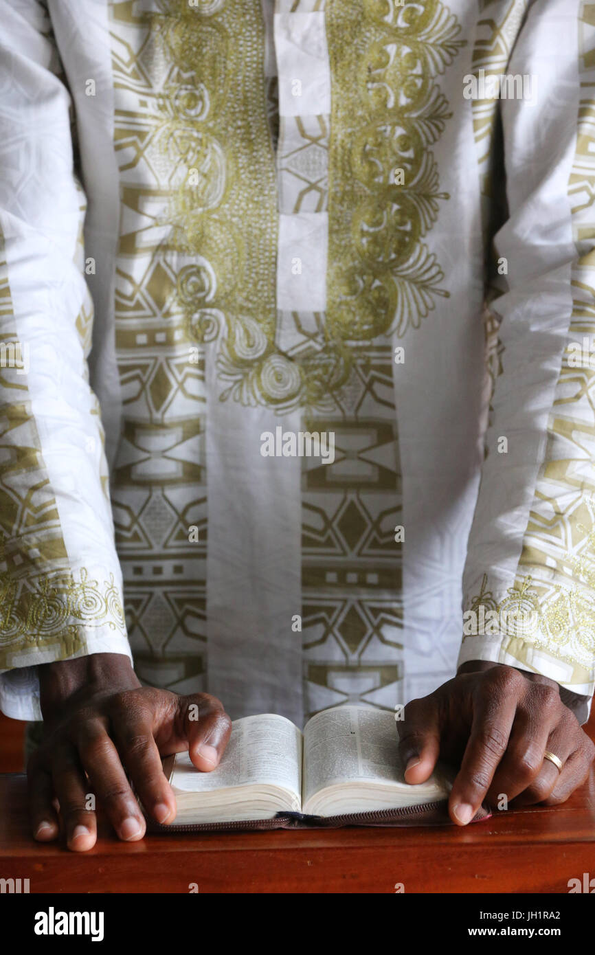 African man reading the bible. Close-up. Lome. Togo Stock Photo - Alamy