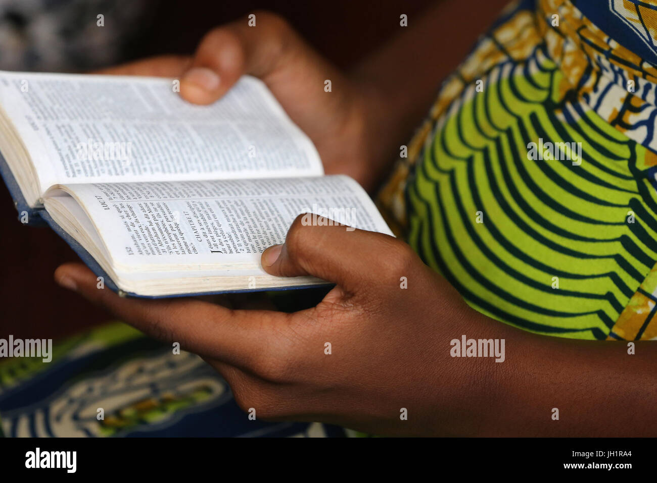 African woman reading bible hi-res stock photography and images - Alamy