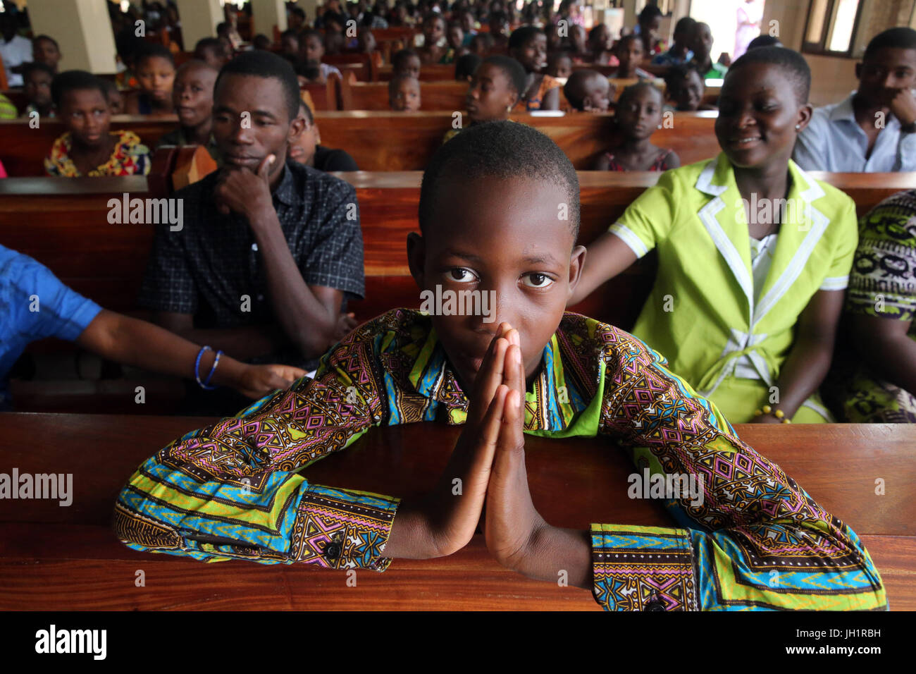 Boy praying catholic church hi-res stock photography and images - Alamy