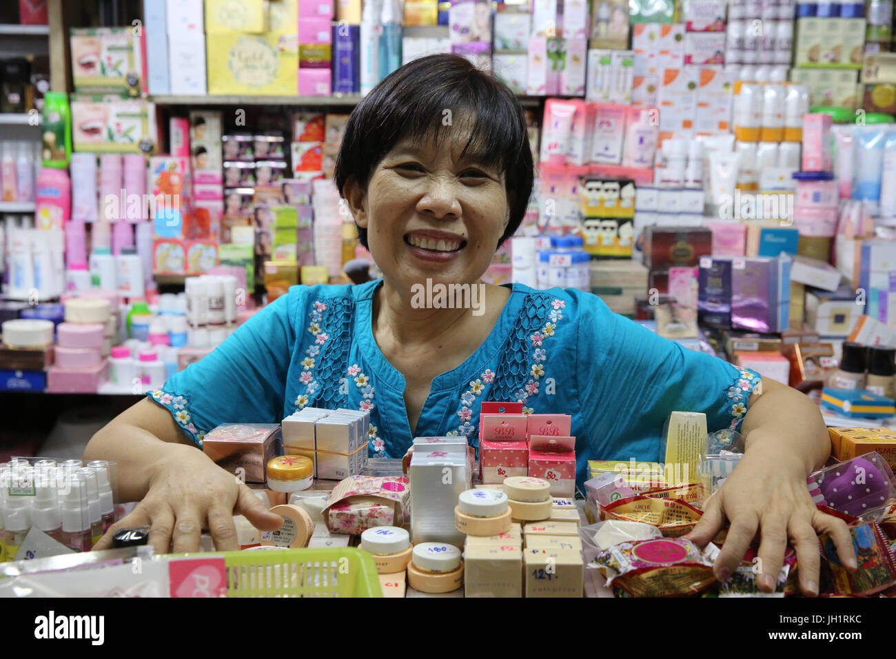 Asian shopkeeper work hi-res stock photography and images - Alamy