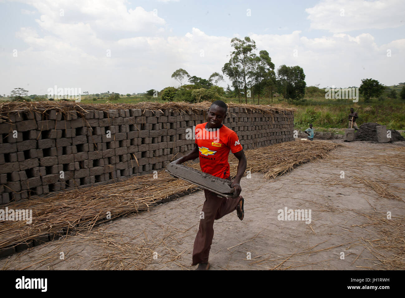 Brick factory financed by a loan from ENCOT microfinance. Uganda Stock ...