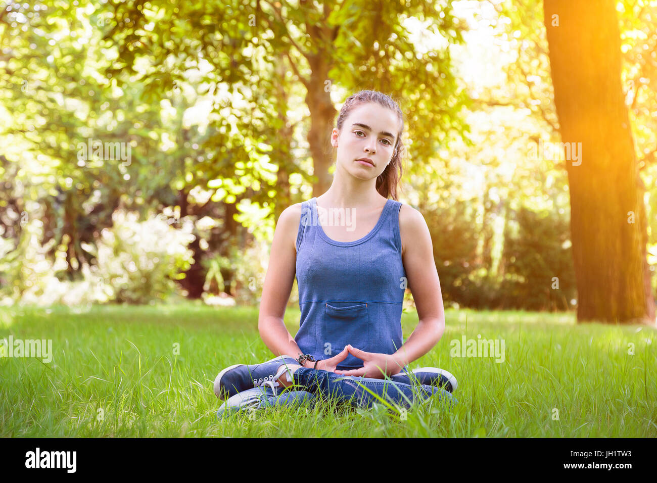 Portrait teenager meditating hi-res stock photography and images - Alamy
