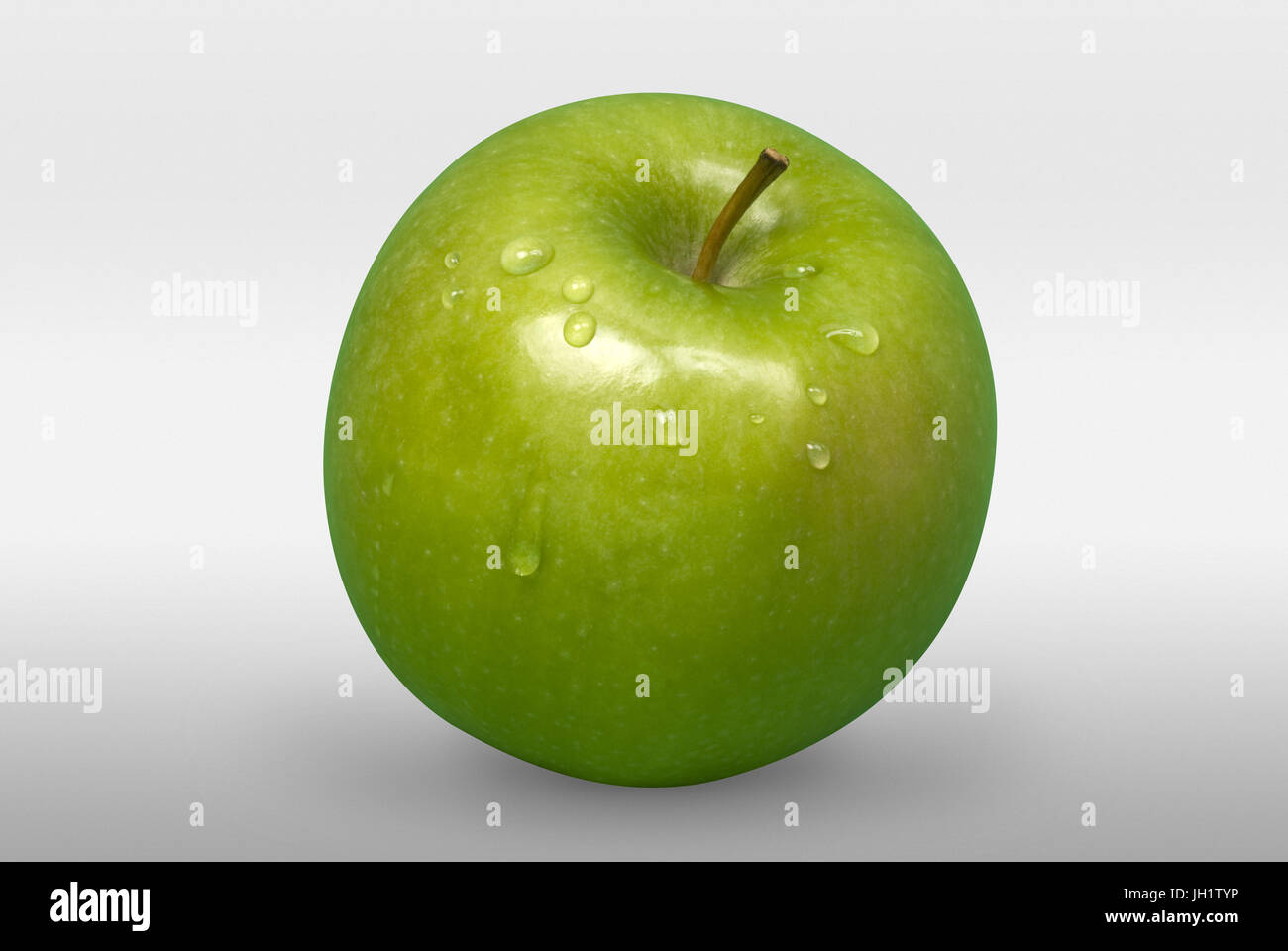 Tasty green apple with drops on white background in front view with ...
