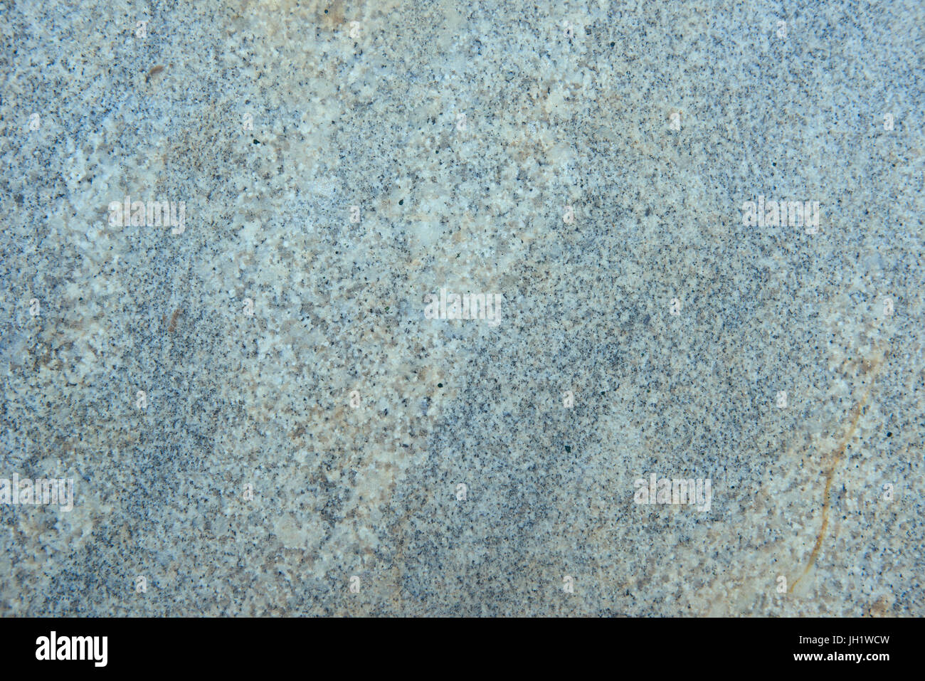 Textured surface of polished granite stone in shades of grey Stock ...