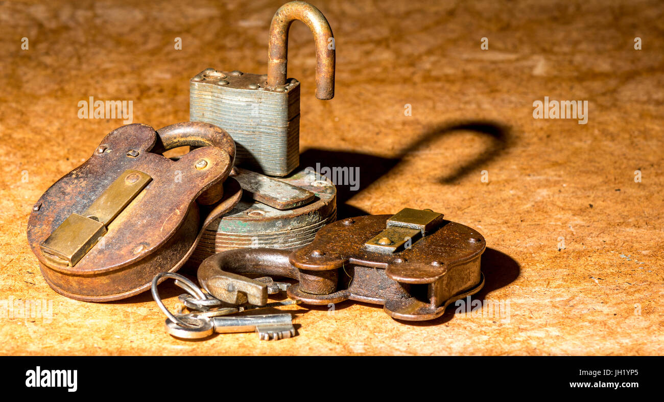 Old rust padlocks and keys Stock Photo - Alamy
