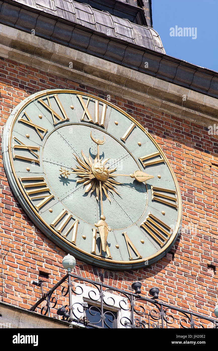 Clock on the former city hall in Krakow (Poland Stock Photo - Alamy