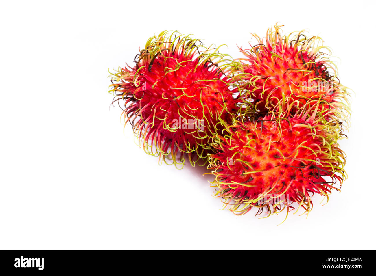 close up of a group of rambutans isolated on a white background Stock ...