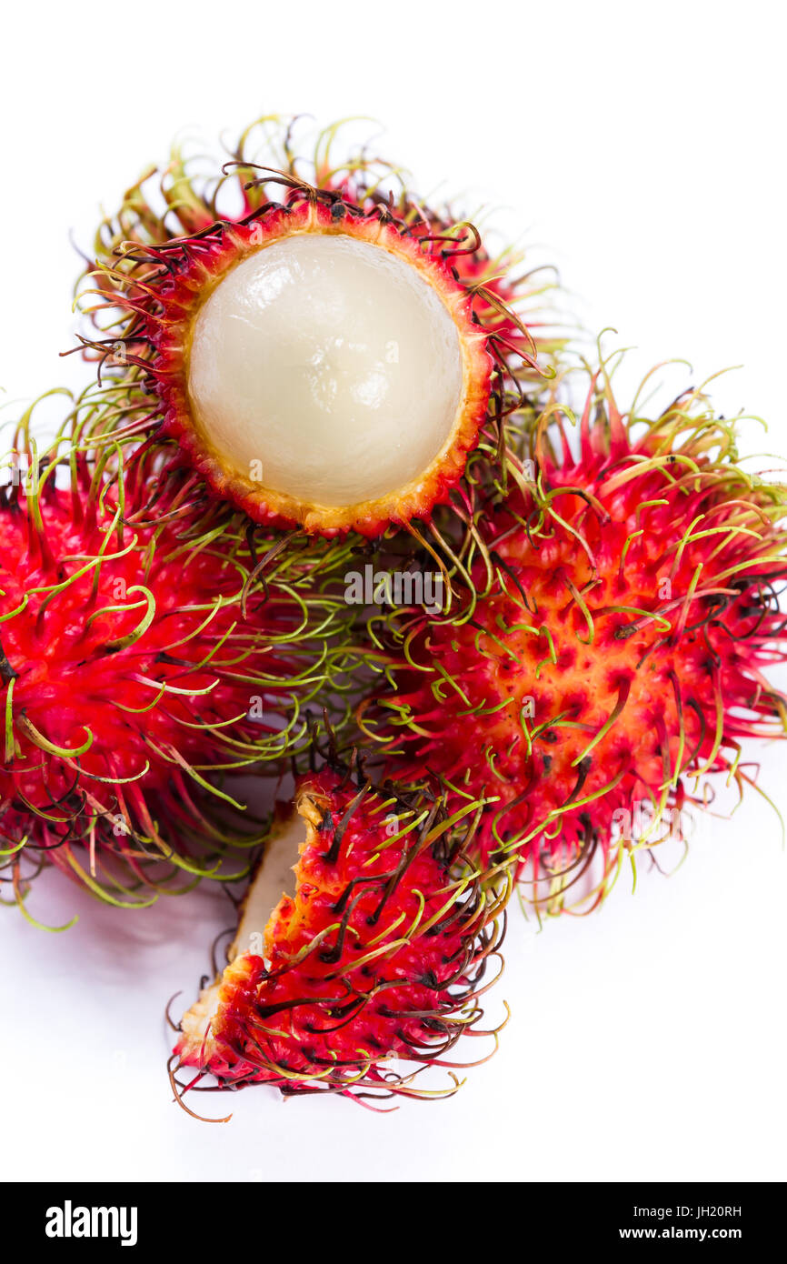 close up of an open rambutan isolated on a white background Stock Photo ...